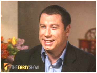 The Alien Travolta - CBS News