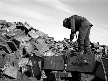 Culling Through Mangled Steel - CBS News