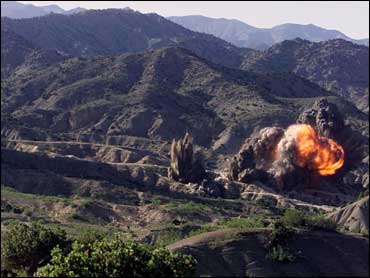 Allied Forces Blow Up Weapons Cache - CBS News