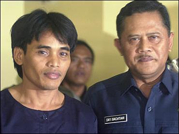 'Smiling Terrorist' Goes On Trial - CBS News