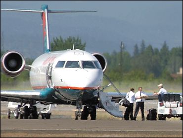 Strange Way To Catch A Plane - CBS News