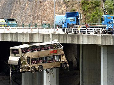 Bus Plunges Off Hong Kong Bridge - CBS News