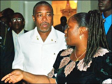 Taylor: Fugitive, Or Exile? - CBS News