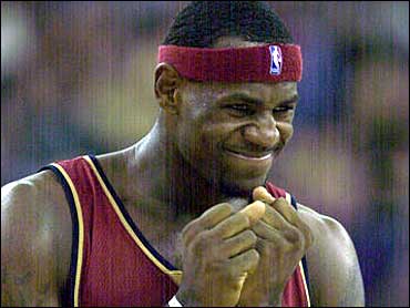 Phenom LeBron's Impressive Debut - CBS News