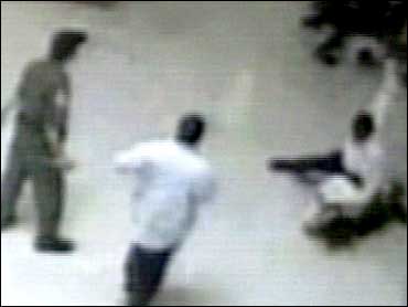 Calif. Inmate Beating On Tape - CBS News