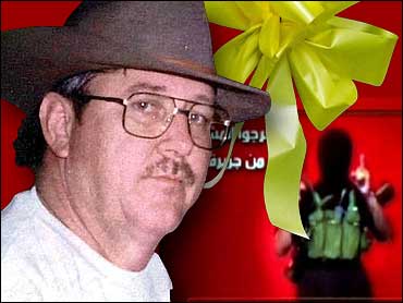Report: U.S. Hostage Beheaded - CBS News
