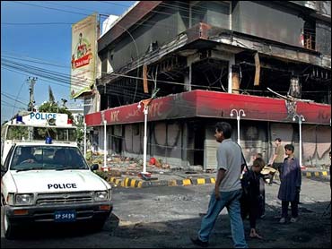 KFC Burned During Riot In Pakistan - CBS News