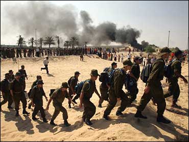 Israel Begins Gaza Withdrawal - CBS News