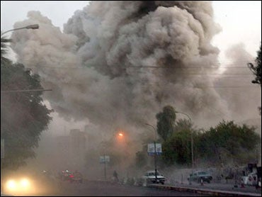 Deadly Blasts Rock Baghdad Hotel - CBS News