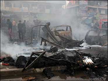 Attack On Iraq Slum Kills Dozens - CBS News