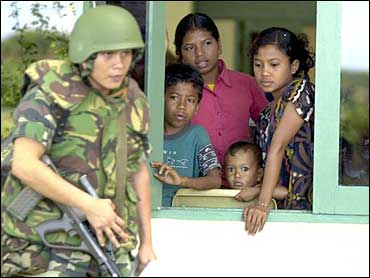 Soldiers Kill 9 In East Timor - CBS News