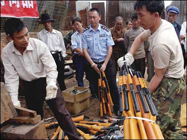 China Cracks Down On Illegal Guns - CBS News