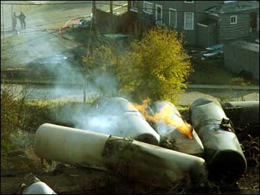 Exploding Tanker Cars Prompt Evacuation - CBS News