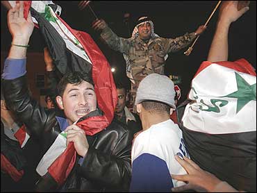 Iraqi-Americans Celebrate Saddam's Death - CBS News