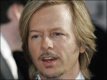 Spade Donates To Slain Officer's Family - CBS News