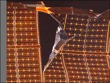 NASA Scrambles To Repair Ripped Solar Wing - CBS News