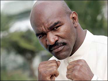 Holyfield's Wife Accuses Boxer of Violence - CBS News