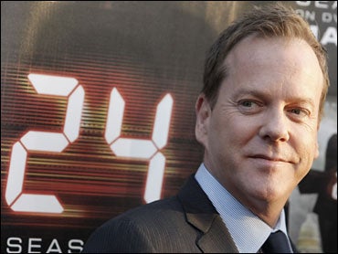 Sutherland Returns Home After Assault - CBS News