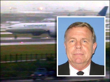 Emergency Landing After Pilot Dies - CBS News
