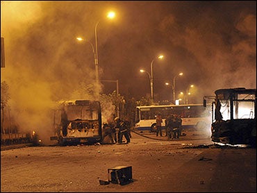 156 Dead, 1000s Arrested in China Riots - CBS News