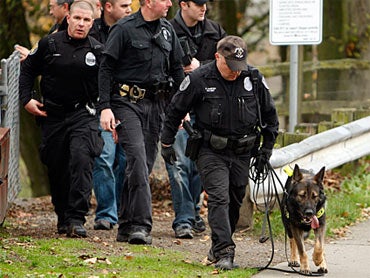 Alleged Cop-Killer Still on the Loose - CBS News