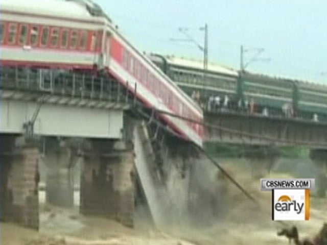 Shocking Video: Train Cars Dangle off Flood-Damaged Bridge in China ...