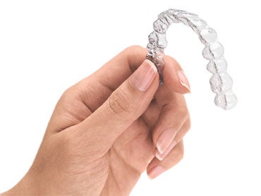 FDA Warns Invisalign Maker on Side Effects - CBS News