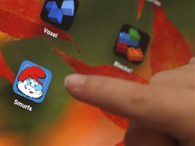 Warning Issued on Popular "Smurfs" Game - CBS News