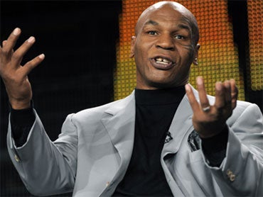 Mike Tyson Shows Love of Racing Pigeons on Show - CBS News