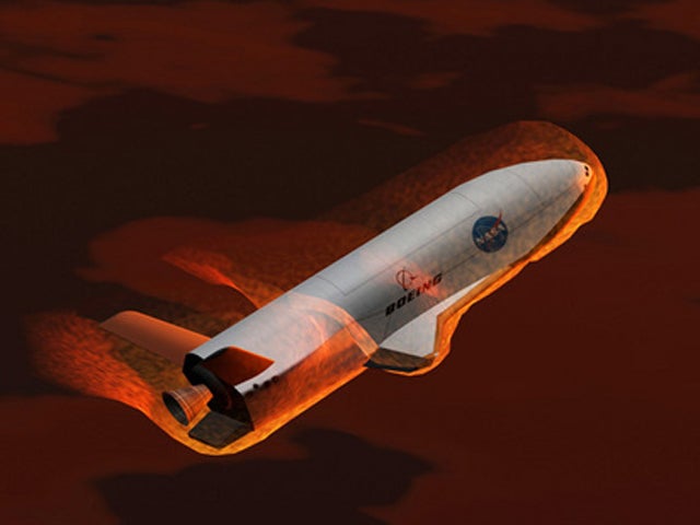 Secretive Air Force space plane sets endurance record - CBS News