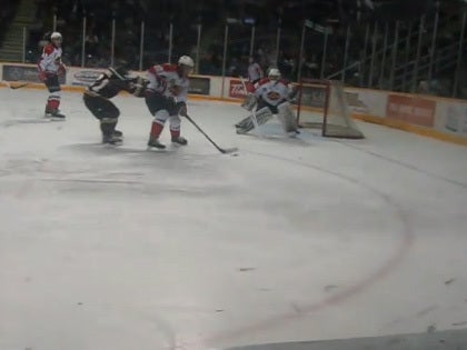 OMG: Puck shatters glass barrier at Screaming Eagles hockey game - CBS News