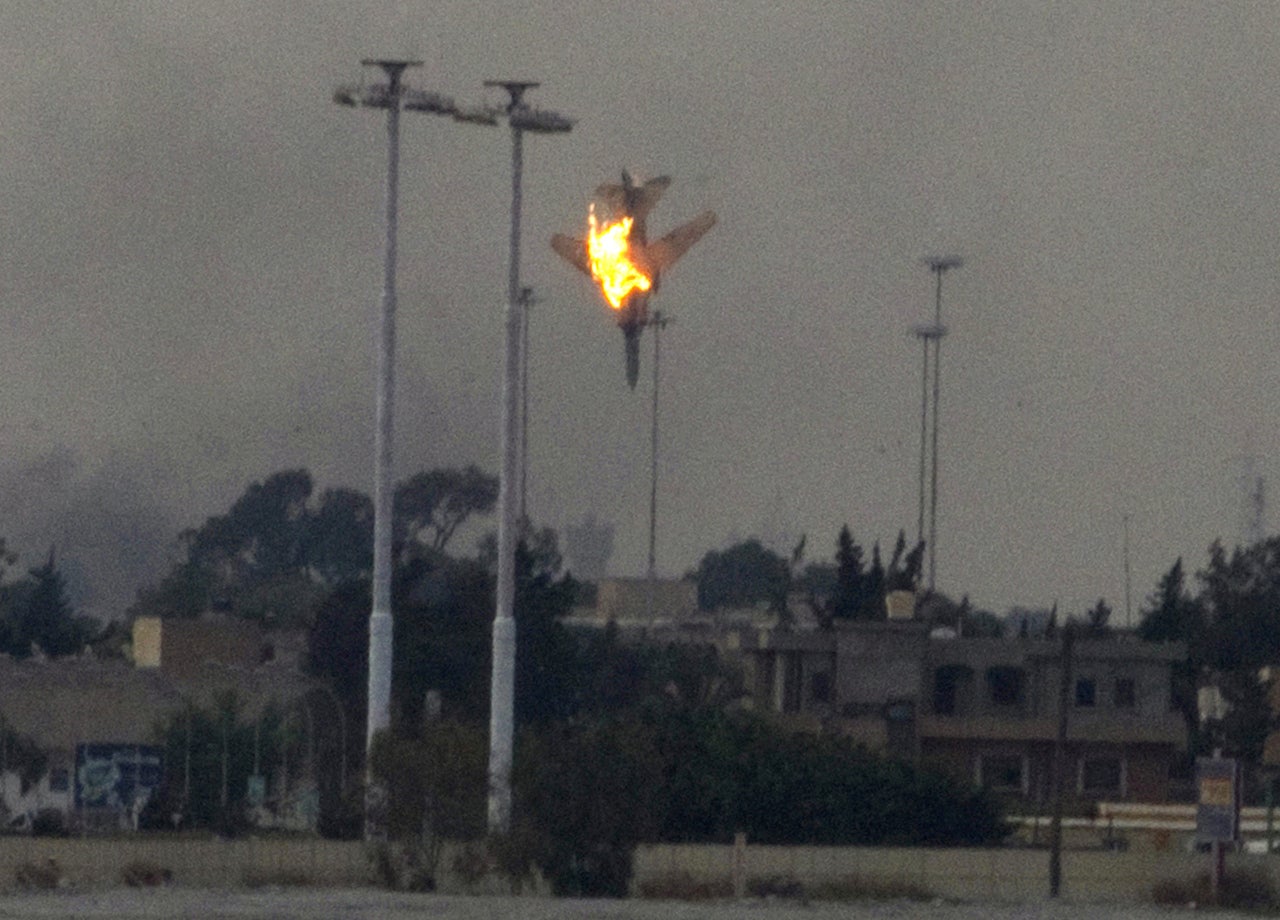 Crisis in Libya: U.S. bombs Qaddafi's airfields - CBS News