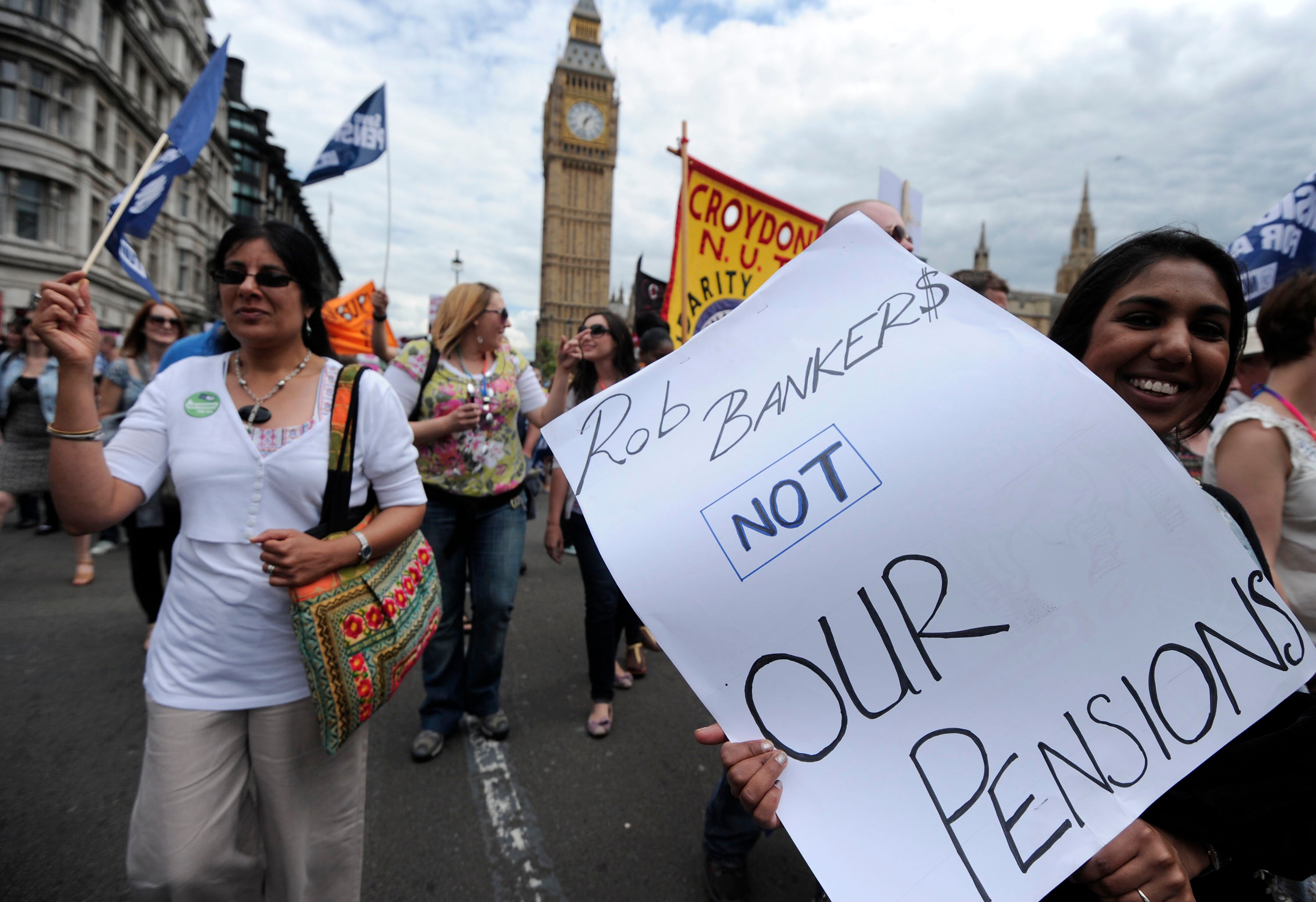 Thousands walk off the job in UK pension protests - CBS News