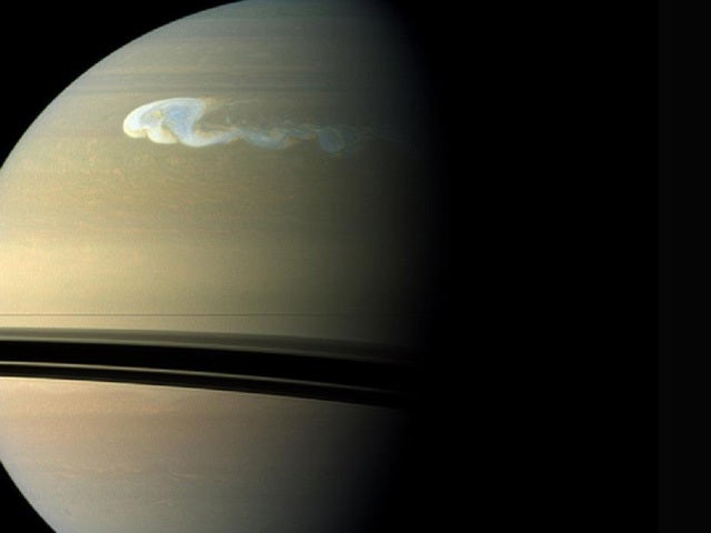 Rare Saturn storm "still going like crazy" - CBS News