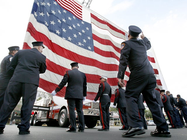 9/11 flag marks half-year after Tucson tragedy - CBS News
