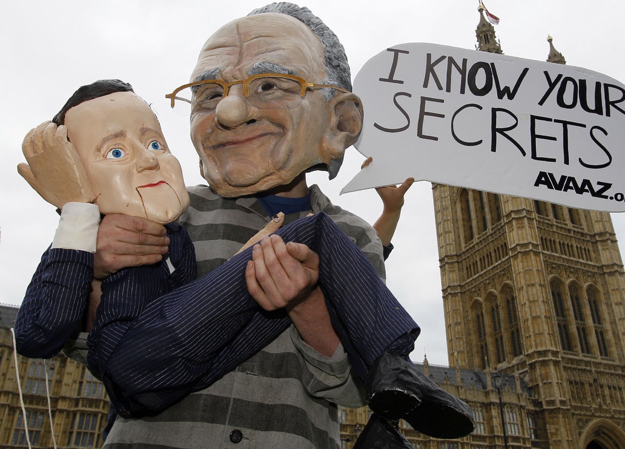 U.K. official: Not embarrassed by Murdoch ties - CBS News