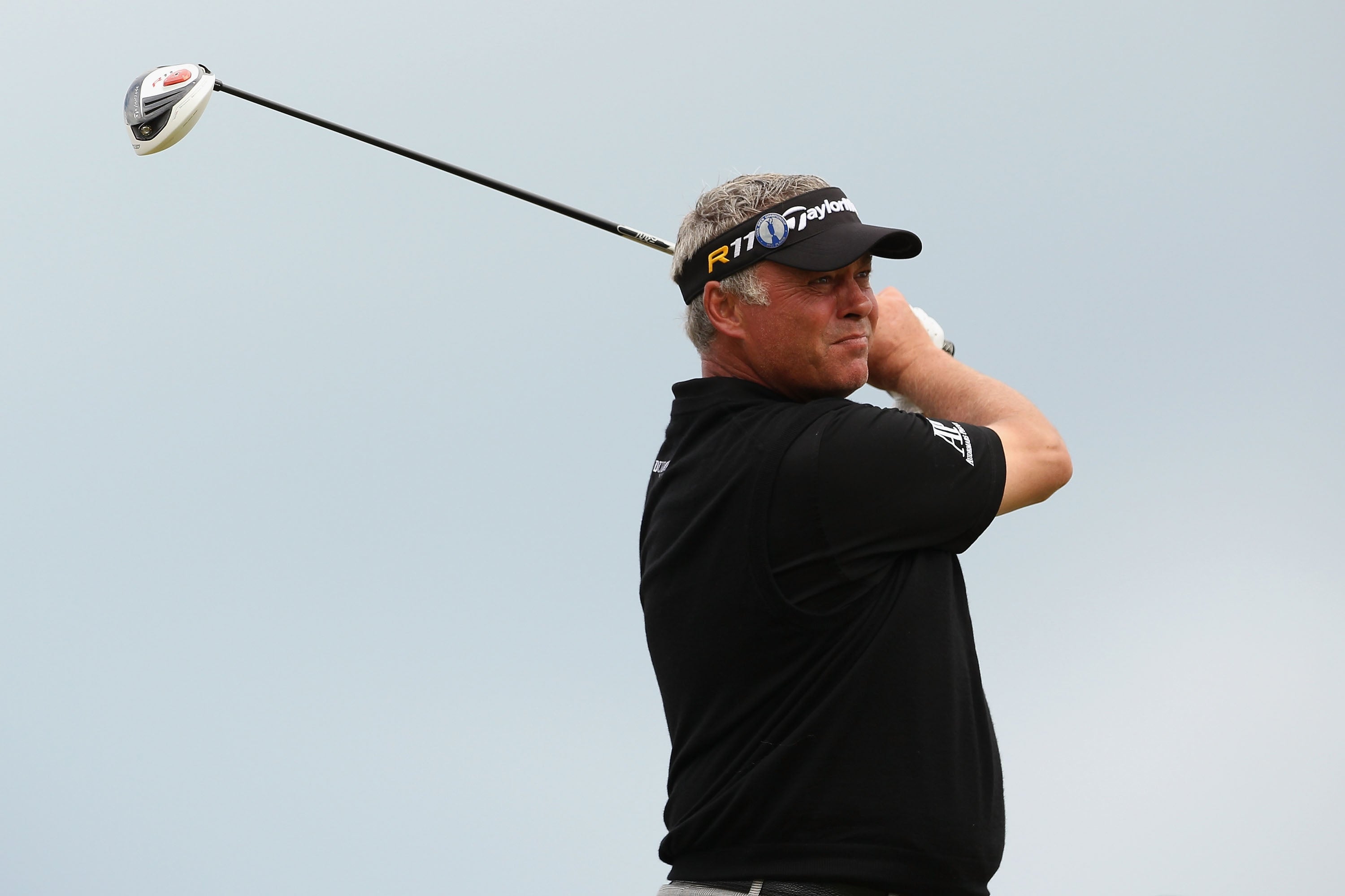Darren Clarke scores 1st big win at British Open - CBS News