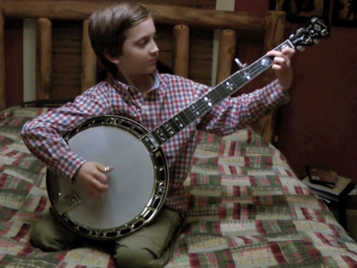 8-year-old boy plays the meanest banjo you've ever seen! - CBS News