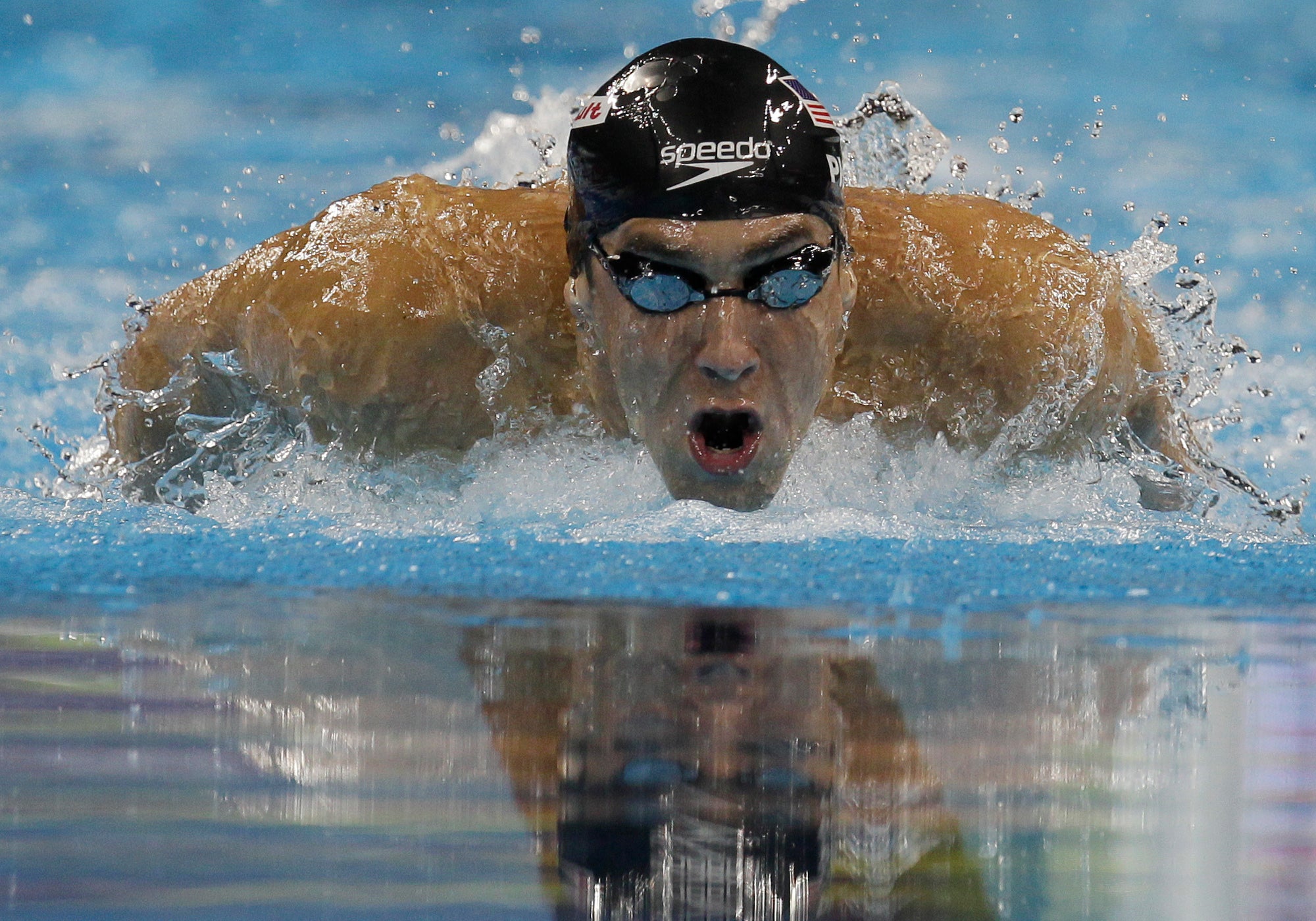 Michael Phelps wins 200 butterfly gold at worlds - CBS News