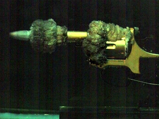 High speed video of pistols fired underwater - CBS News