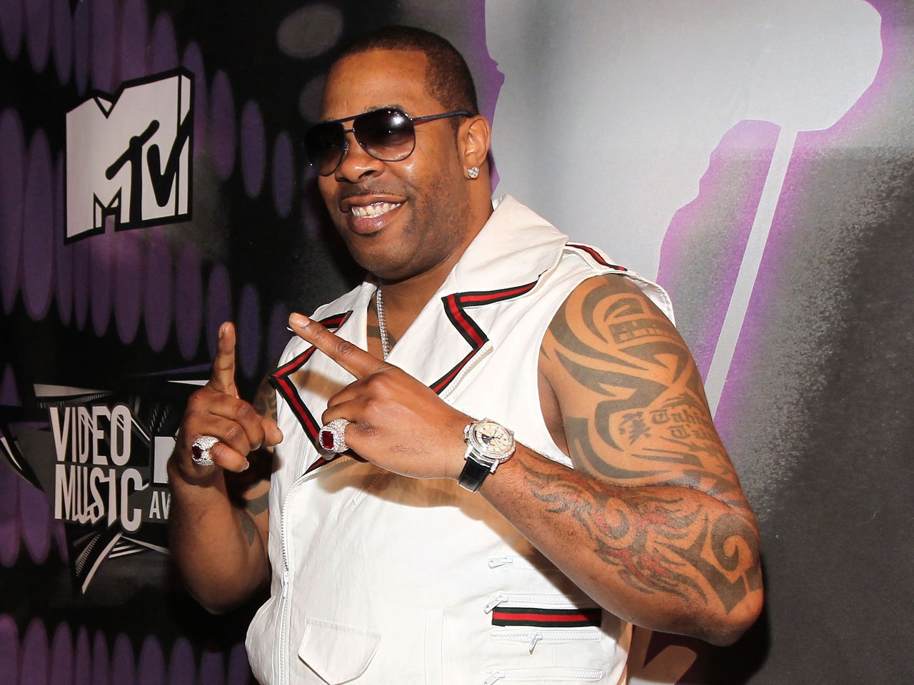 Rapper Busta Rhymes charged with assault - CBS News