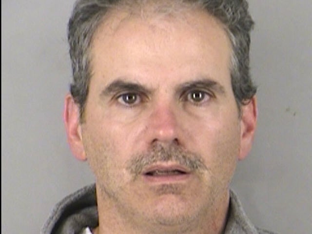 Man in airport bomb scare calls charges "absurd" - CBS News