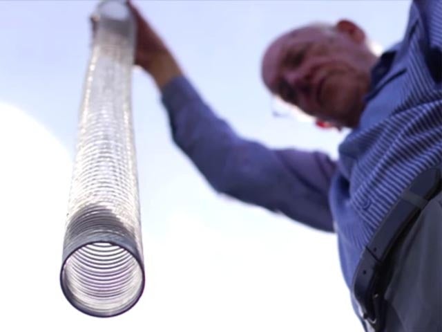 What happens when you drop a slinky (in slow motion?) - CBS News