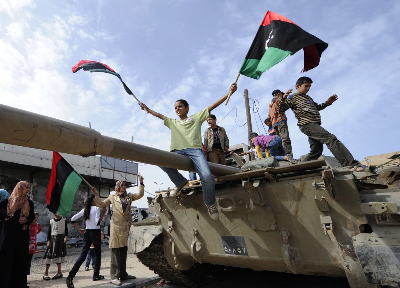 Libya declares itself liberated from Qaddafi - CBS News