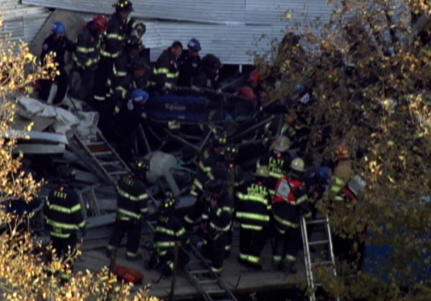 3 workers rescued after NYC building collapse - CBS News