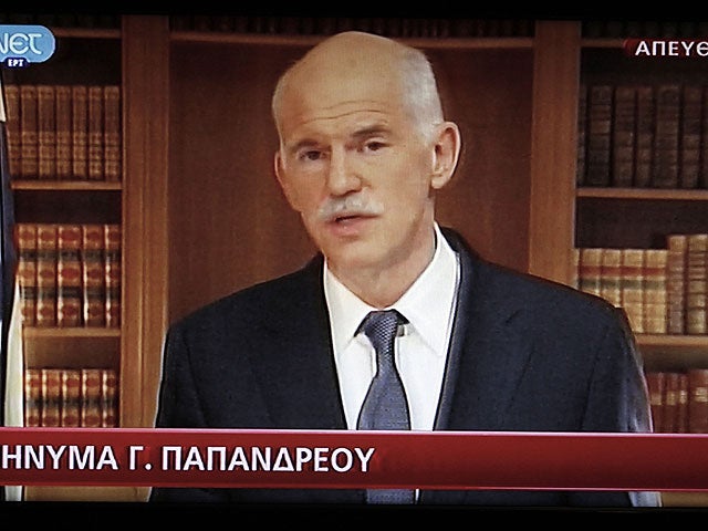 Papandreou on way out as coalition deal reached - CBS News