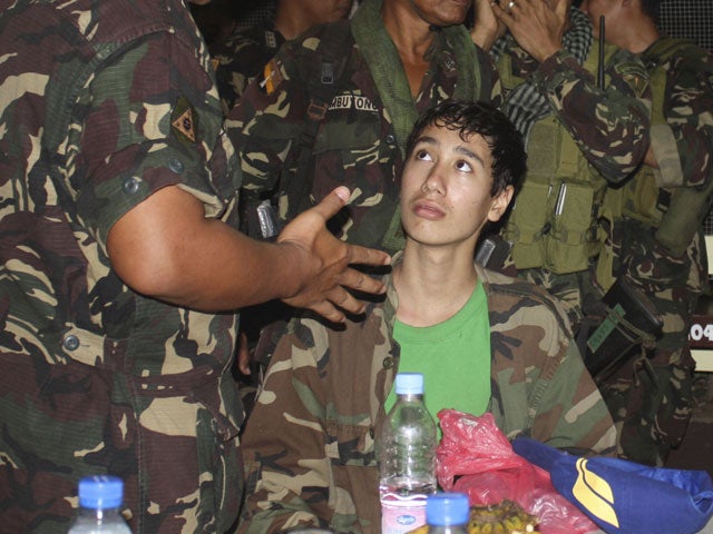 Dad: Son "hero" for escaping Philippine captors - CBS News