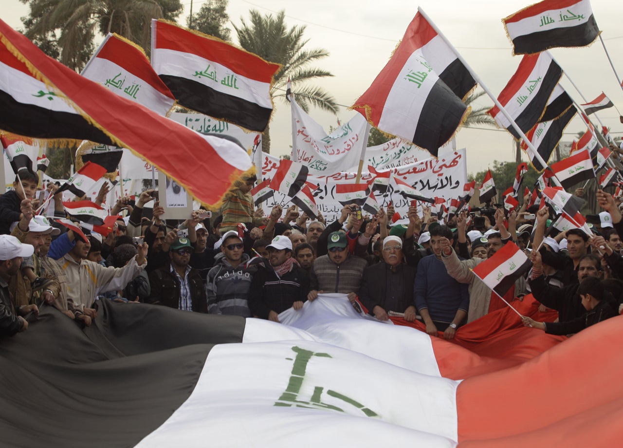 Iraqis cheer departure of U.S. forces - CBS News