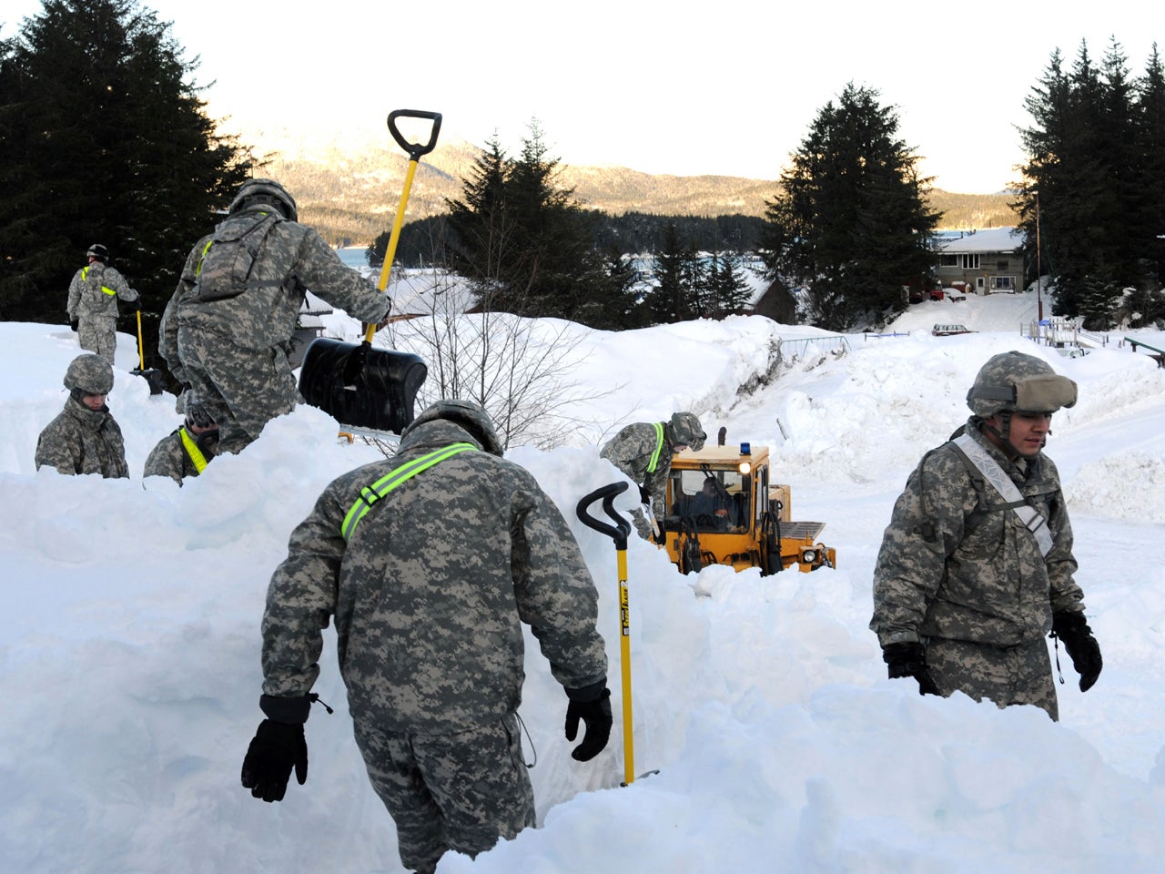Alaska town gets help digging out of snowy prison - CBS News