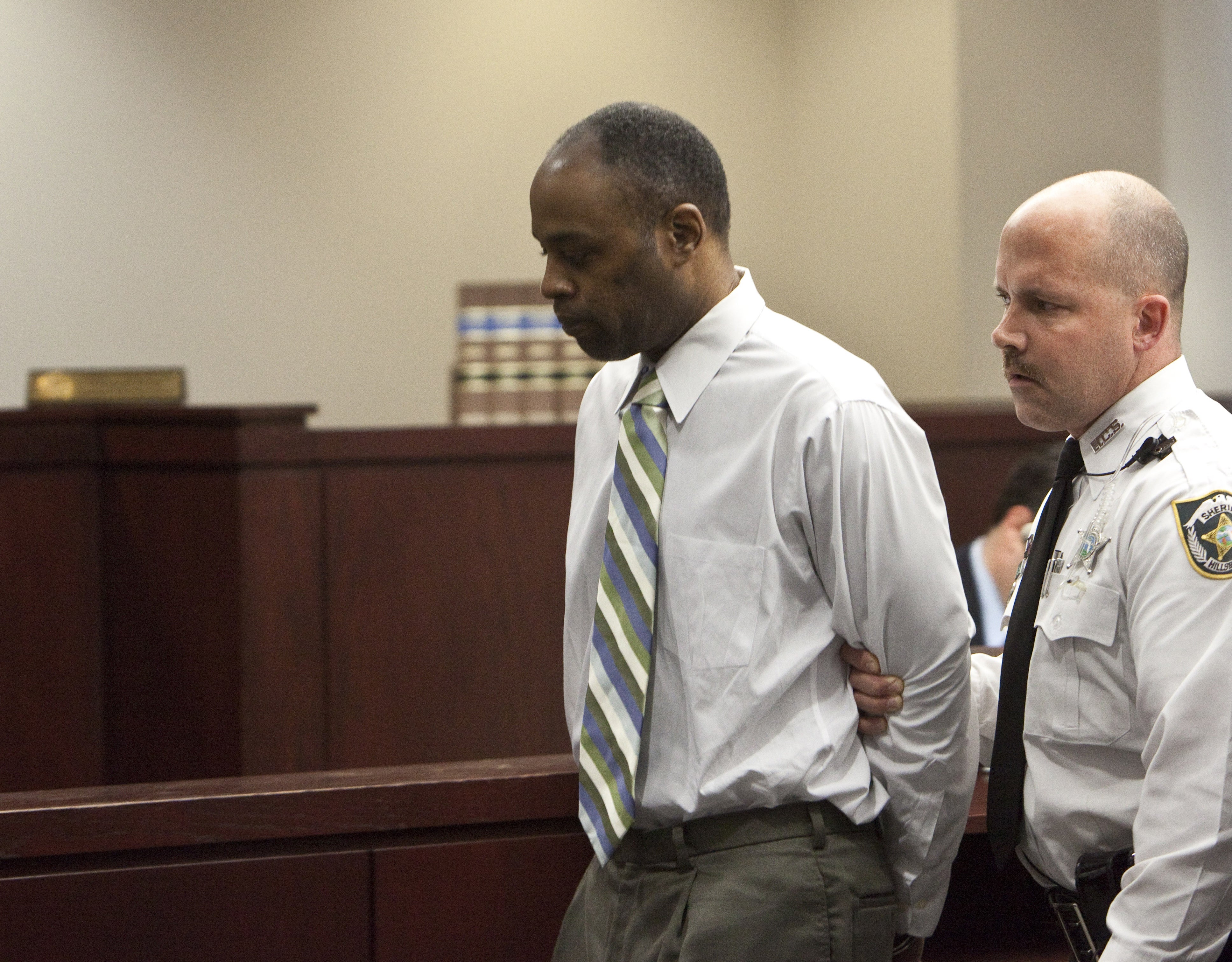 Ex-NYPD detective Christopher Hanney found guilty of setting wife on ...